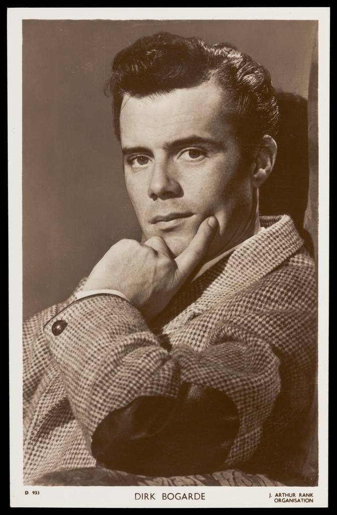 Dirk Bogarde. Photographic postcard, 195-. | Wellcome Collection