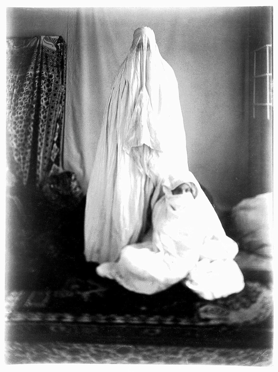 Afghan ladies in their Purdah dress (Chador). Kabul. | Wellcome Collection