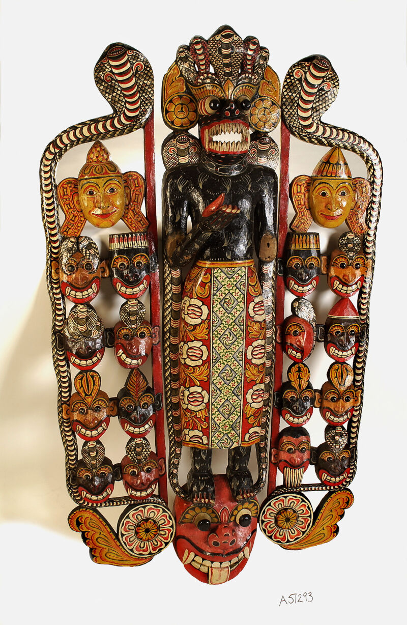 Sinhalese mask used in exorcism and showing the heads of eighteen ...