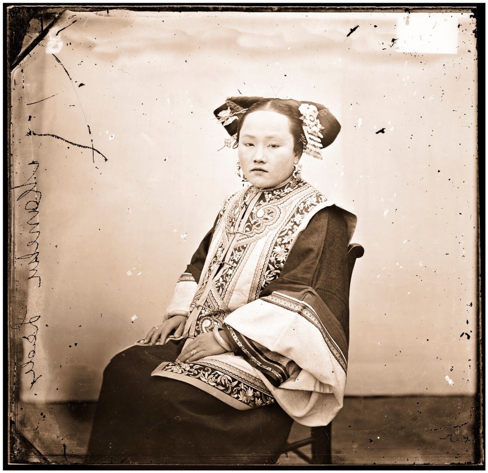 Peking, China: a seated Manchu lady wearing a coiffure. Photograph by ...