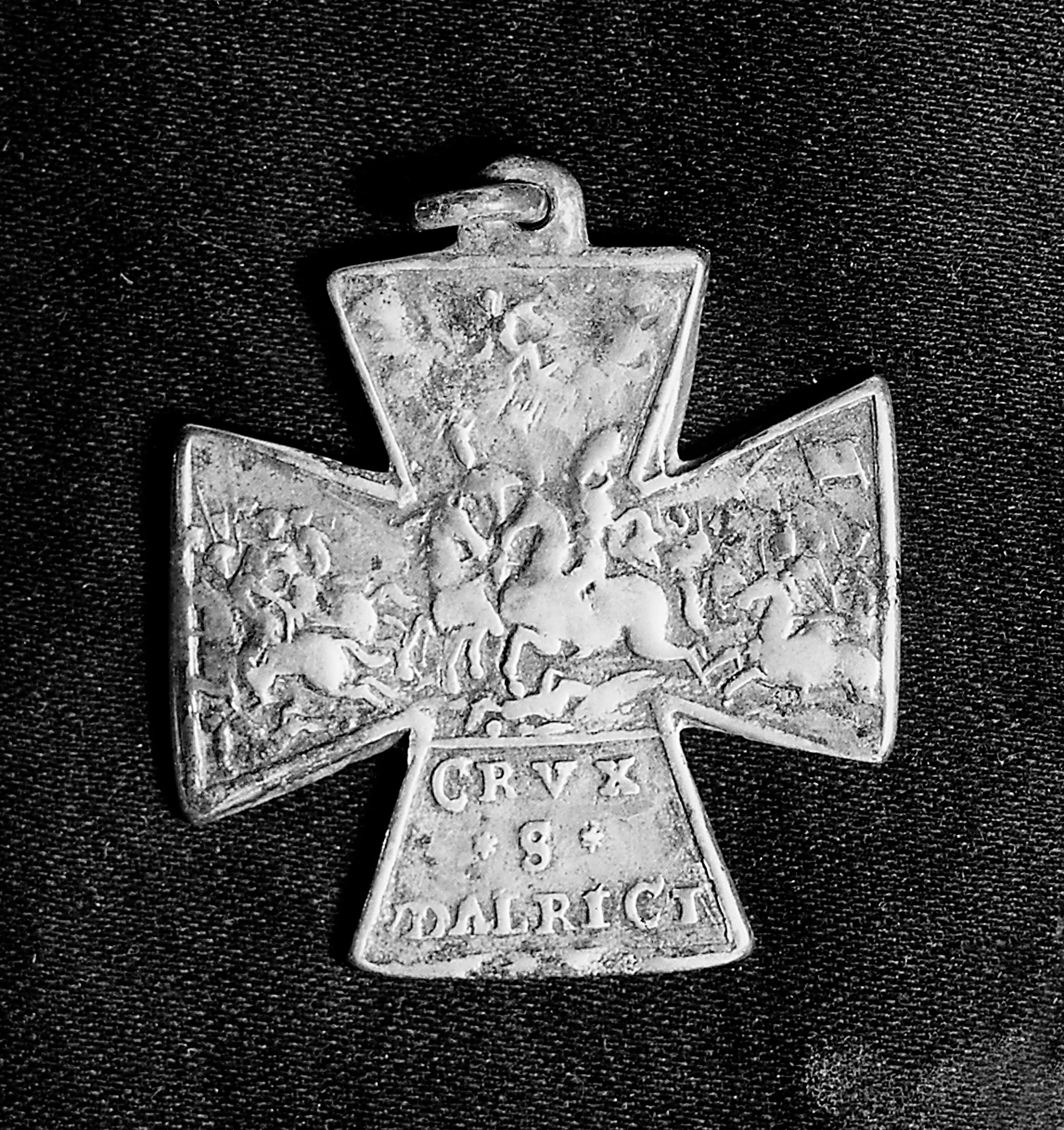 The cross of St. Ulrich. Maltese shaped cross, with scene showing ...