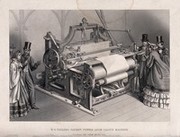 Textiles: a three-quarter view of a power loom, with admiring visitors ...