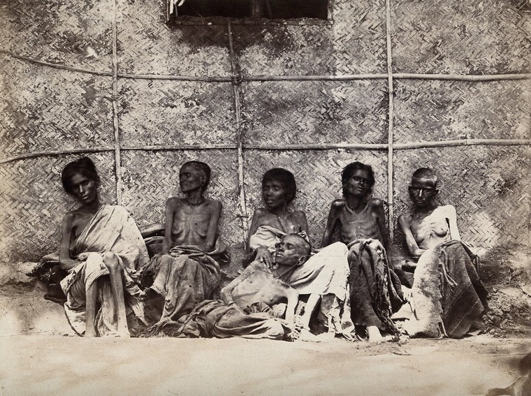 Famine in Mysore, India: six emaciated women, five sitting and one ...