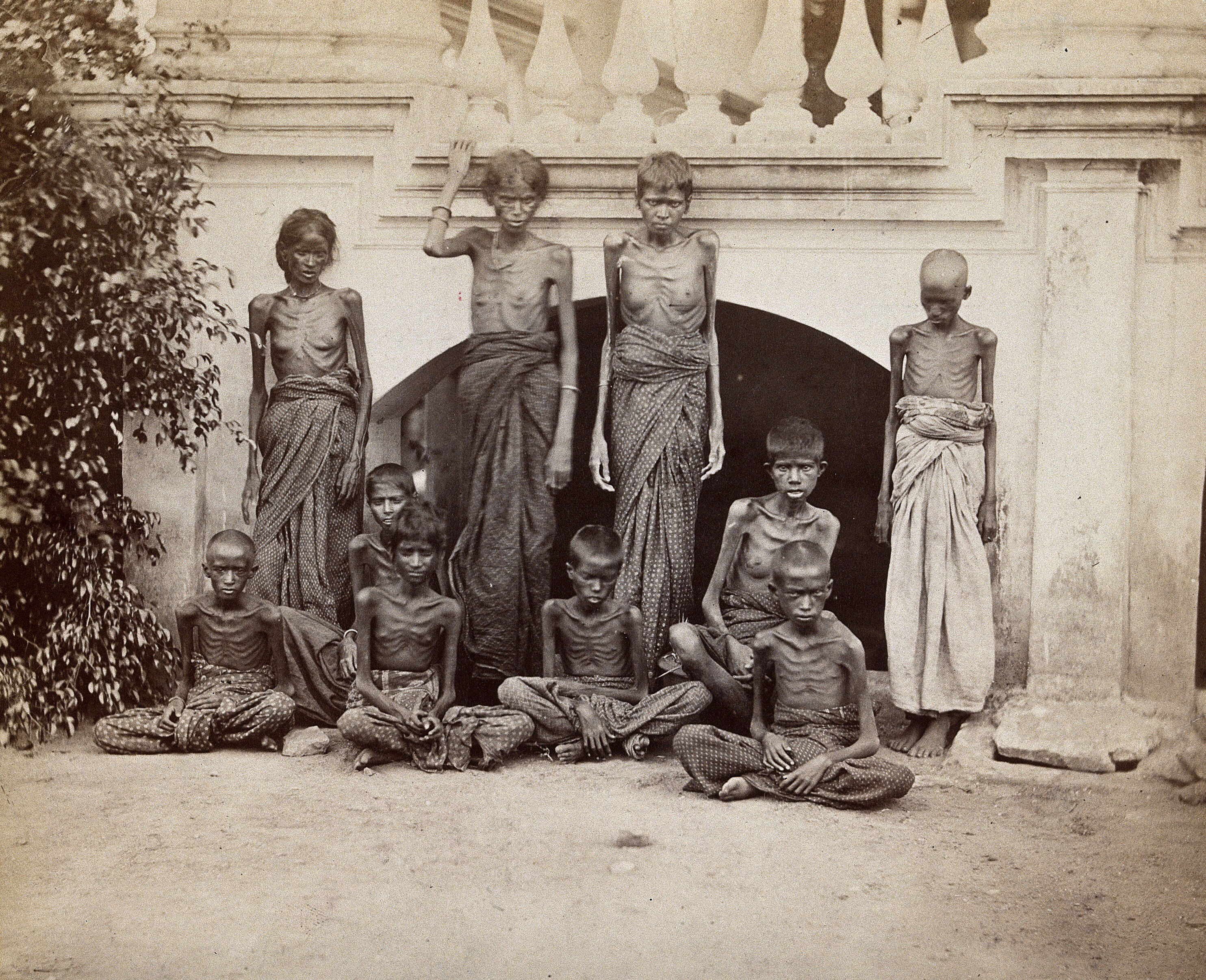 Famine in Bangalore, India: a group of emaciated women and children ...